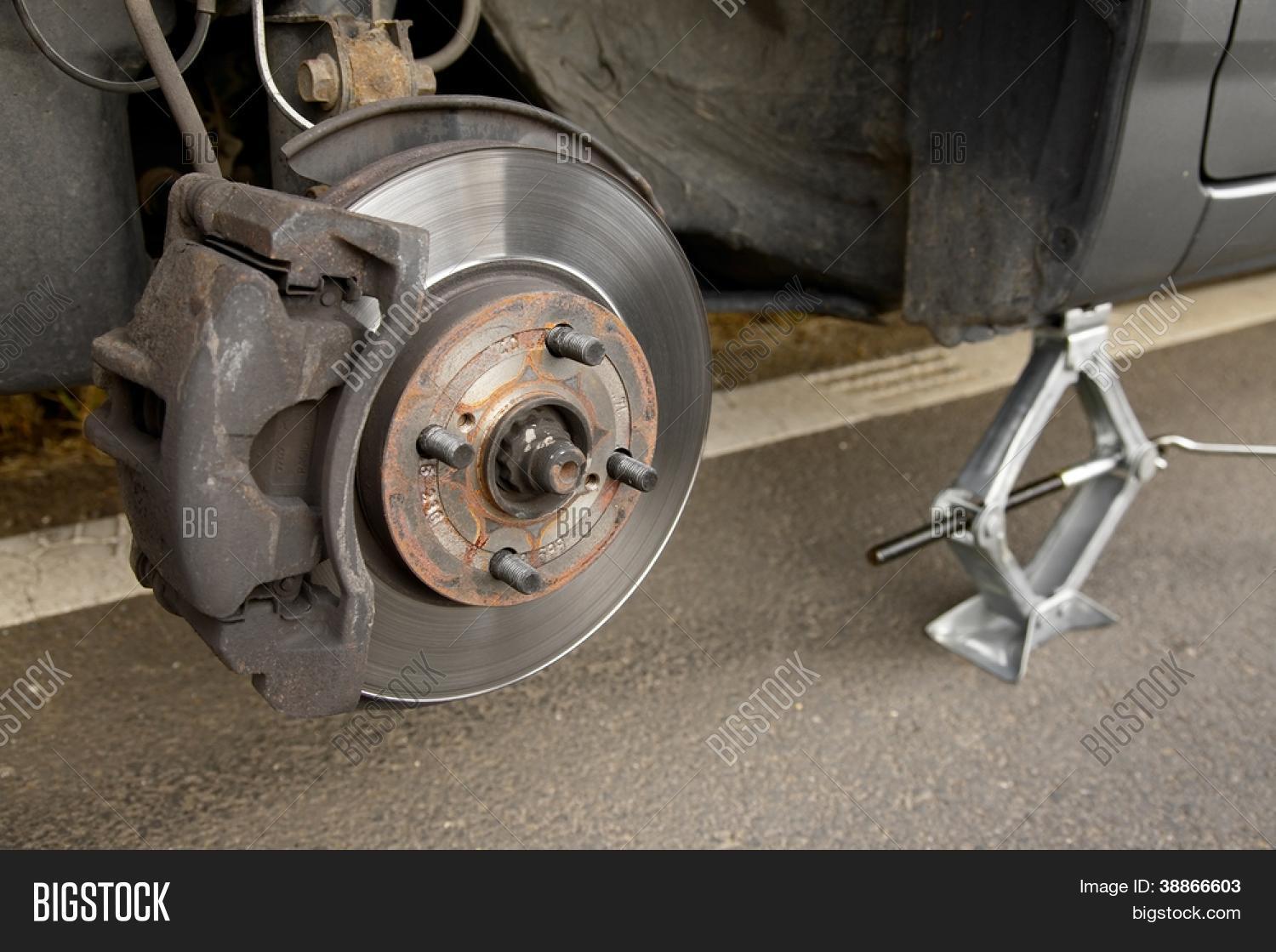 Changing Wheels On Car Image & Photo (Free Trial) | Bigstock