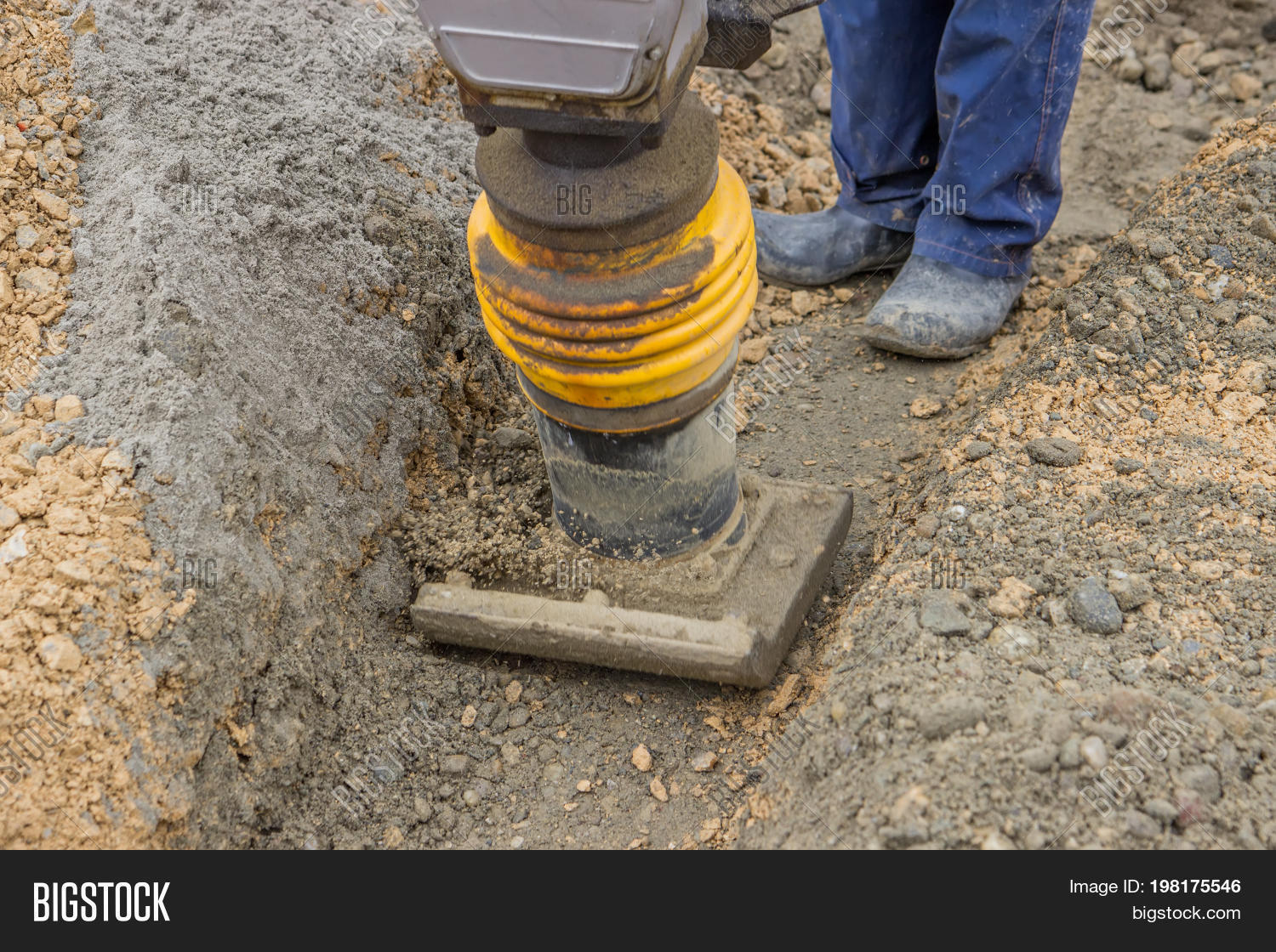 Worker Compacting Sand Image & Photo (Free Trial) | Bigstock