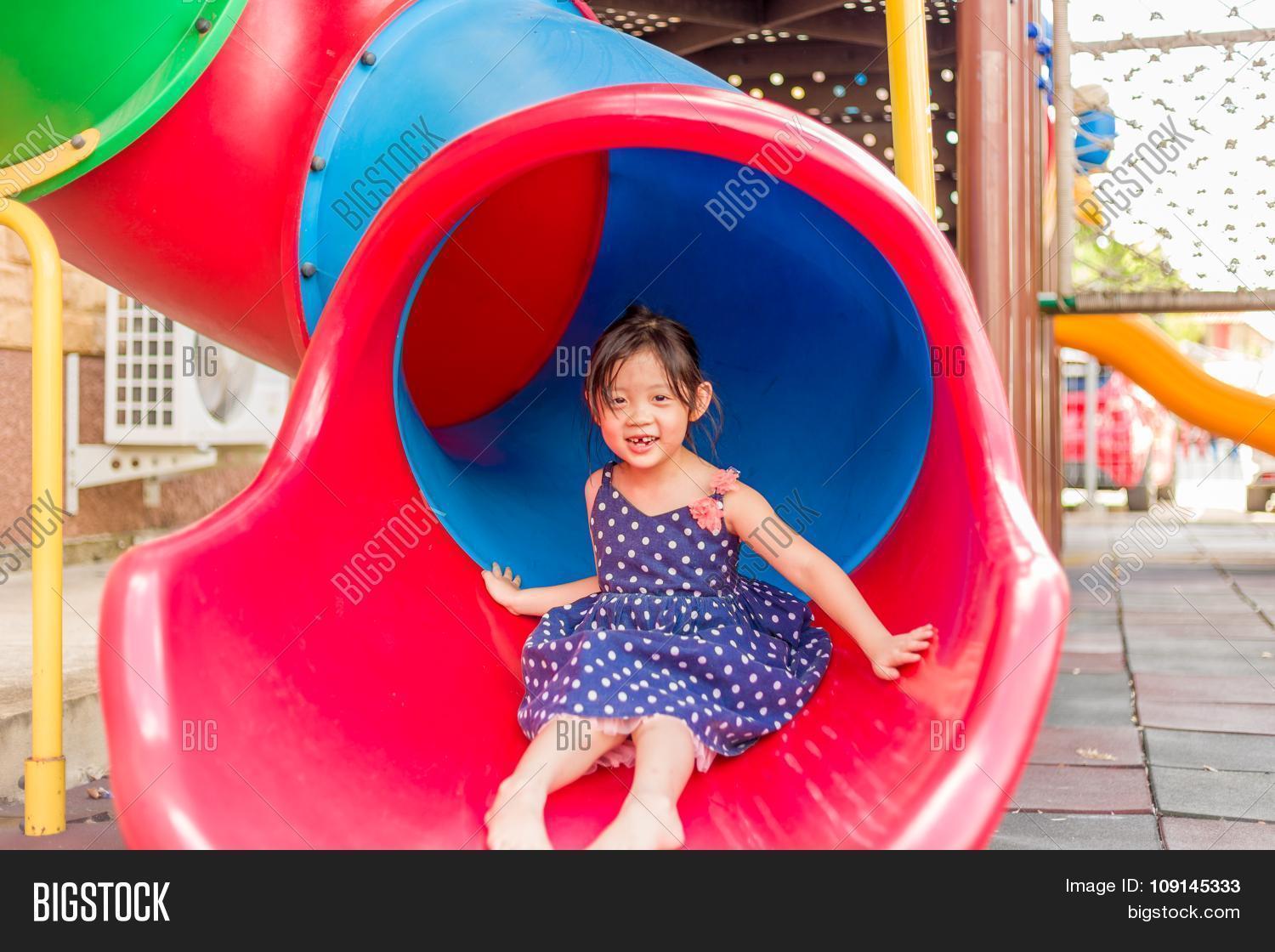 Little Girl Playing On Image & Photo (Free Trial) | Bigstock