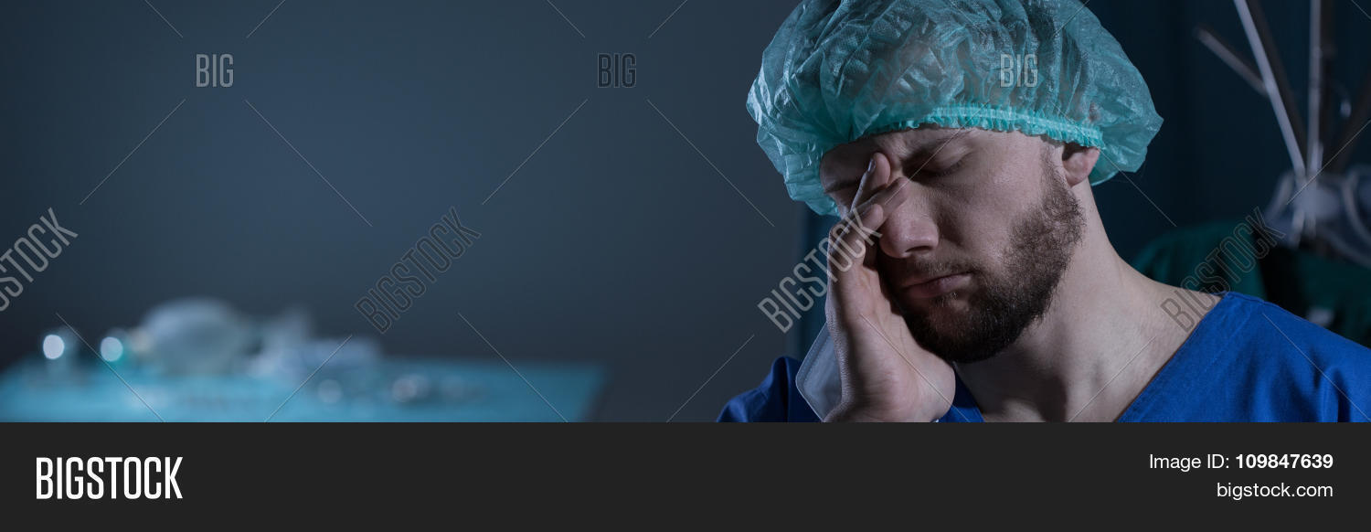 Doctor Grieving Over Image & Photo (Free Trial) | Bigstock
