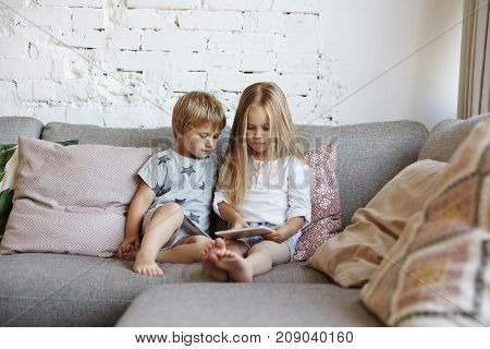 Two Siblings Using Image & Photo (Free Trial) | Bigstock