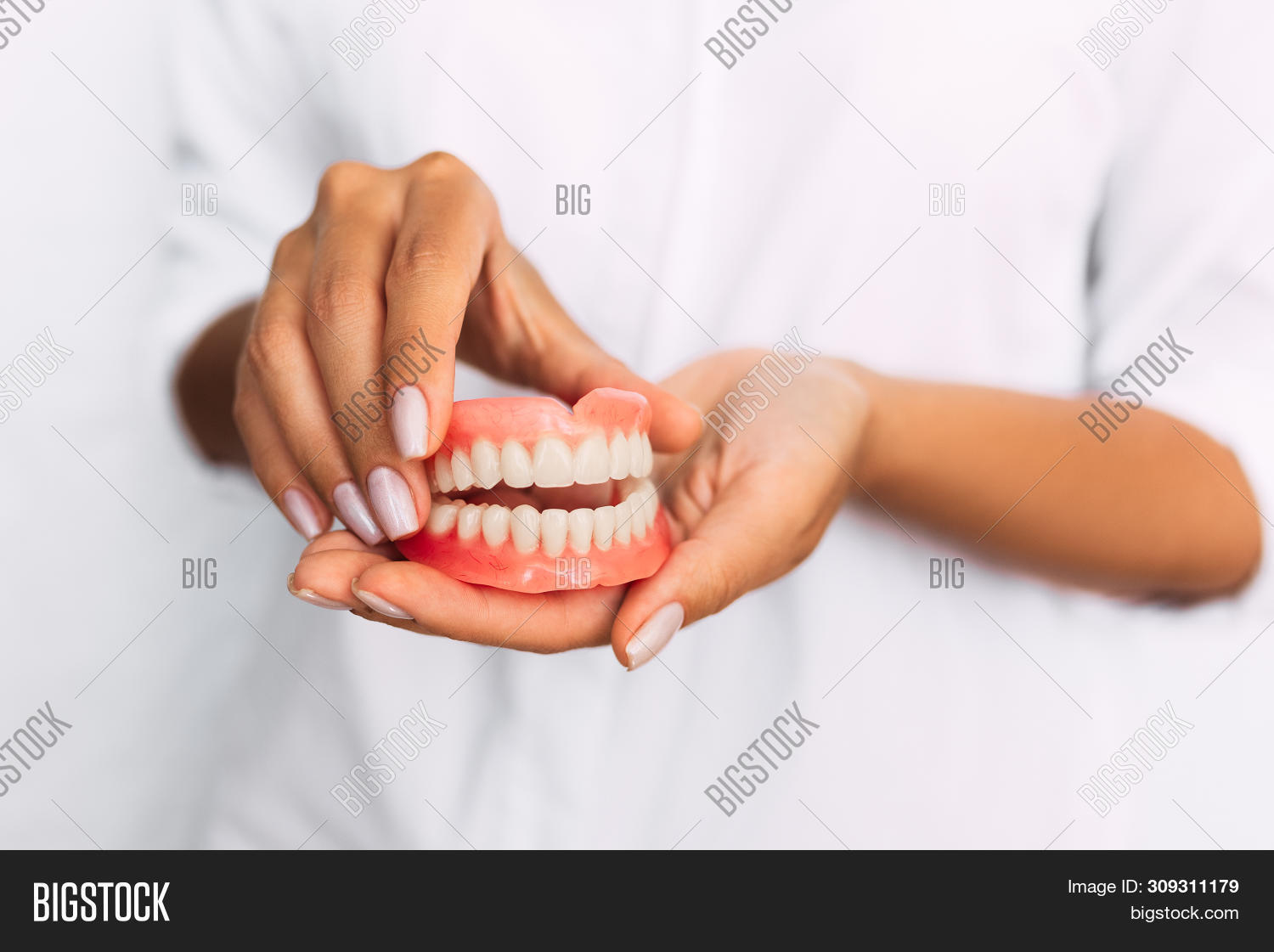 Dentist Holding Image & Photo (Free Trial) | Bigstock