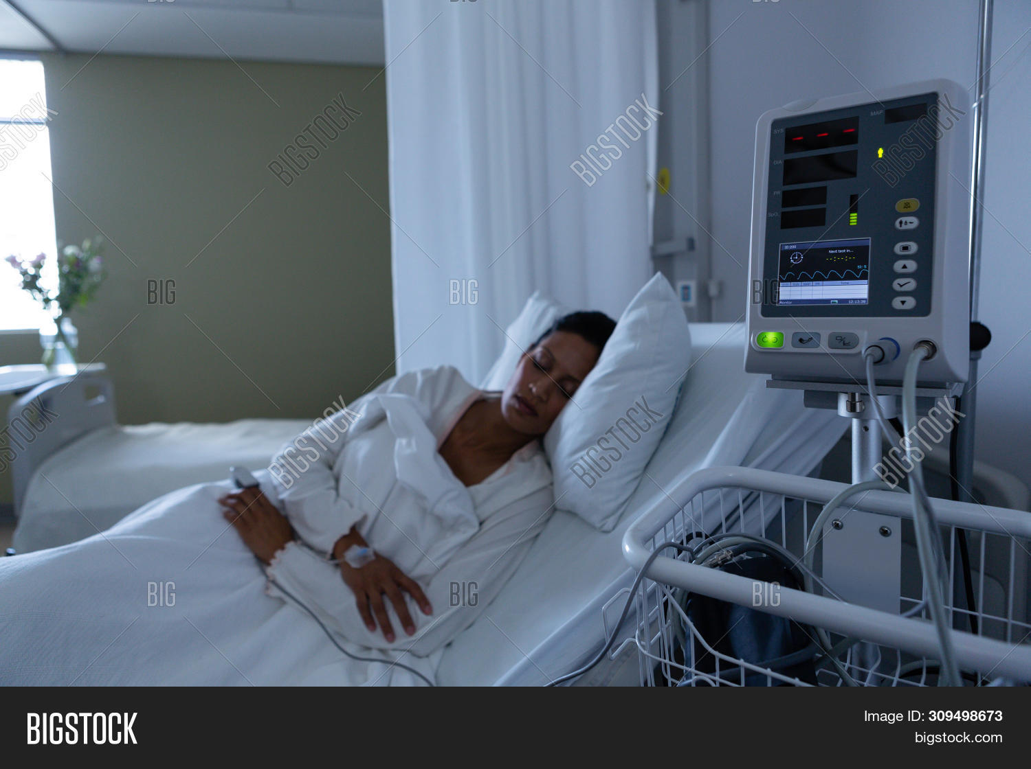 Hospital Room With Female Patient