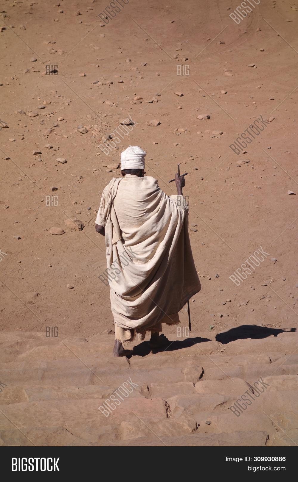 Holy Man Walking Down Image & Photo (Free Trial) | Bigstock