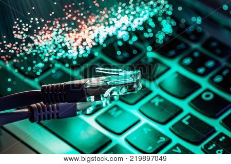 network cable closeup with fiber optical background color fiber optical ...