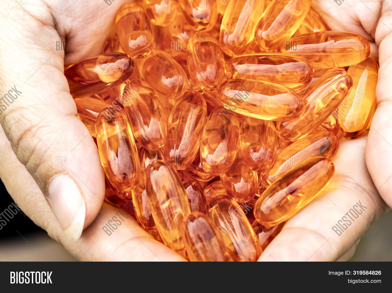 Woman Holding Fish Oil Image & Photo (Free Trial) | Bigstock