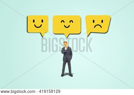 Customer Feedback Concept : Businessman Standing And Thinking To Choose ...