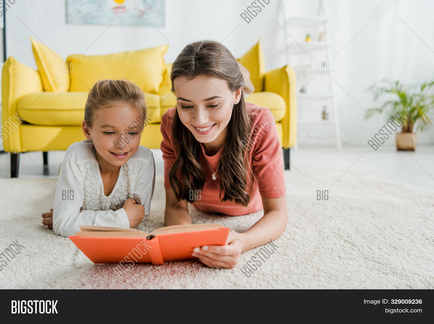 Happy Babysitter Lying Image & Photo (Free Trial) | Bigstock