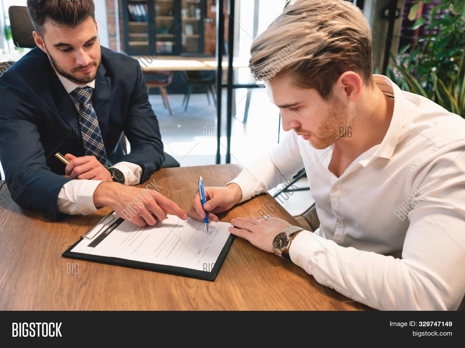 Man Signs Agreement Image & Photo (Free Trial) | Bigstock