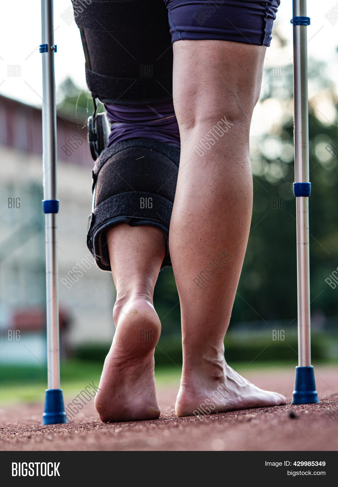 Hurt Runner Walk By Image & Photo (Free Trial) | Bigstock