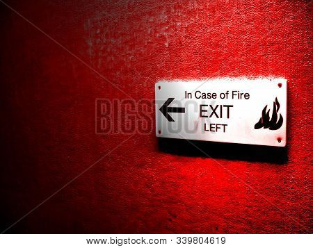 Fire Exit Sign On Wall Image & Photo (Free Trial) | Bigstock
