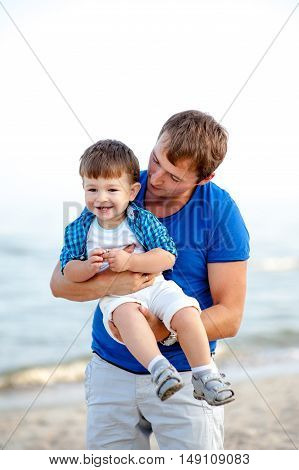 Men Hug Boy On Sea Image & Photo (Free Trial) | Bigstock