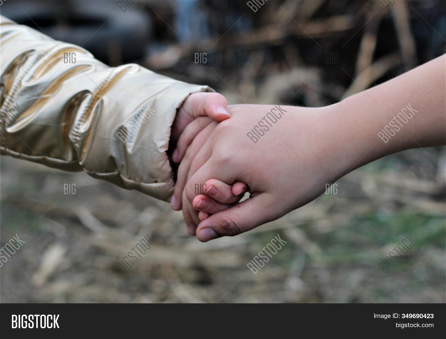 Two Hands Hold On Dark Image & Photo (Free Trial) | Bigstock