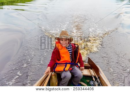 Boy Driving Motor Boat Image & Photo (Free Trial) | Bigstock