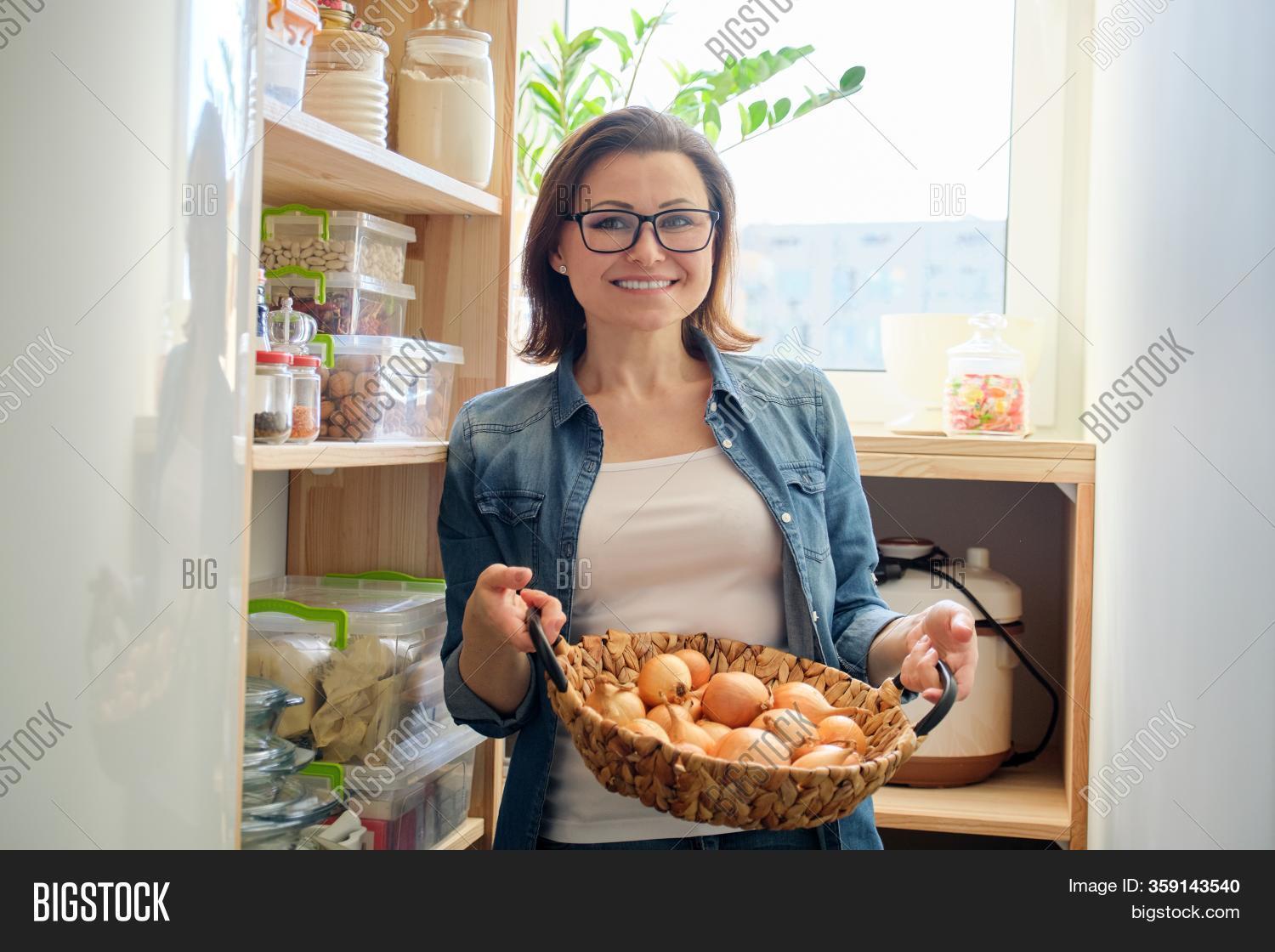 Woman Pantry Taking Image & Photo (Free Trial) | Bigstock
