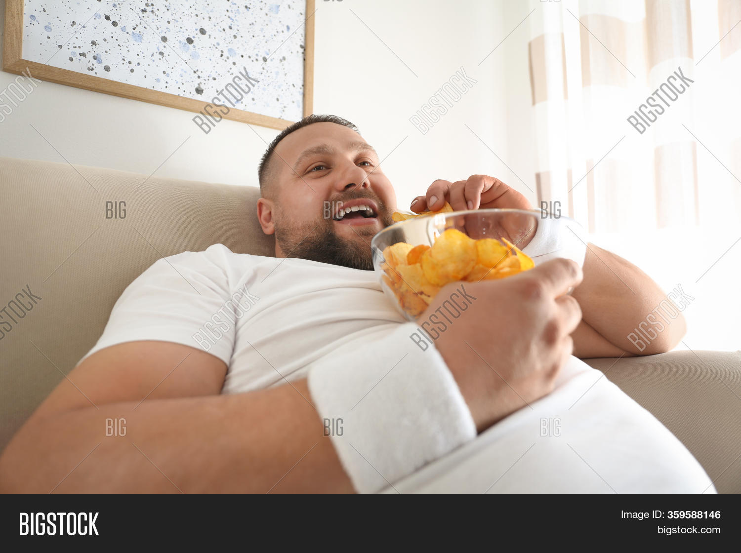 Overweight Man Eating