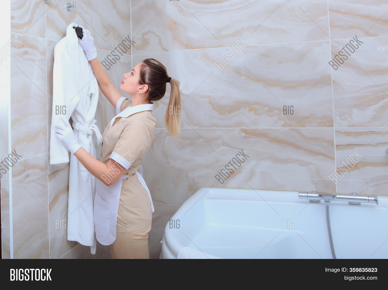 Maid Bathroom Hangs Image & Photo (Free Trial) | Bigstock