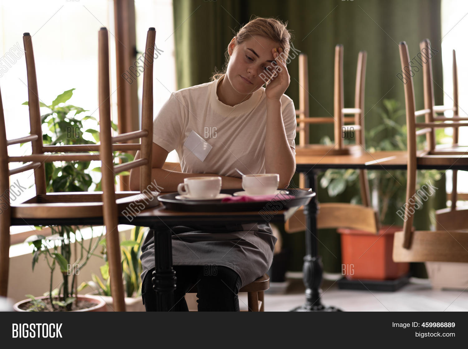 Tired Waitress Sitting Image & Photo (Free Trial) | Bigstock