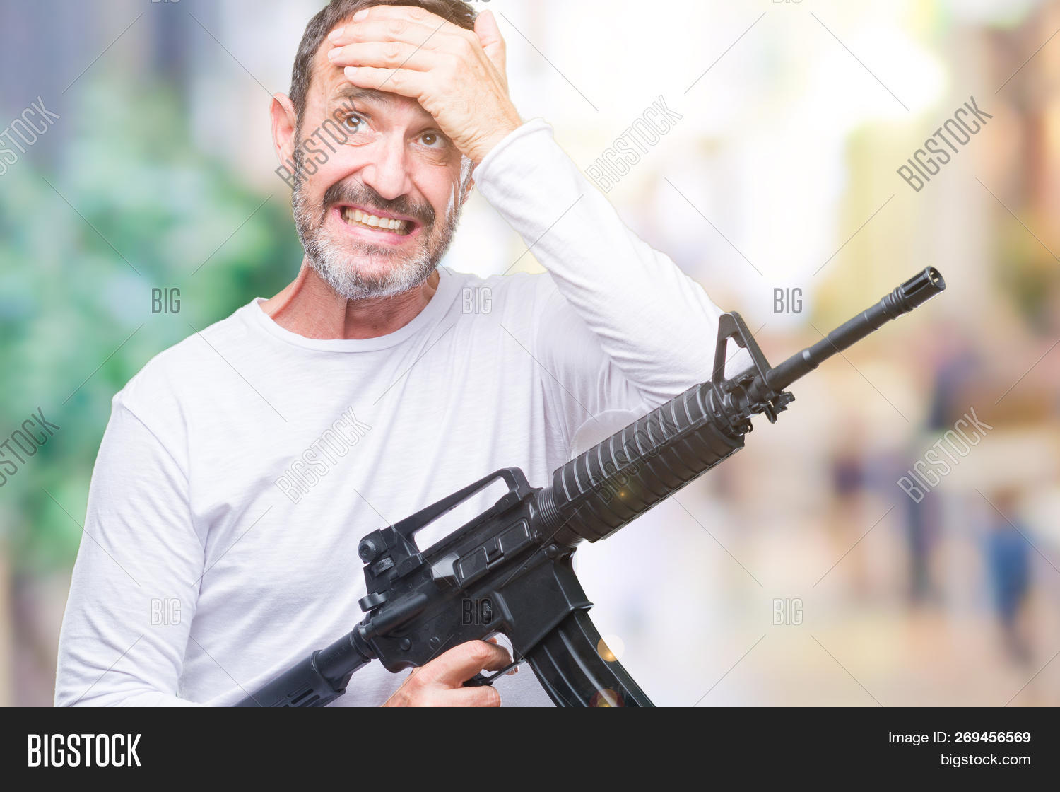 Hand Holding Gun To Head