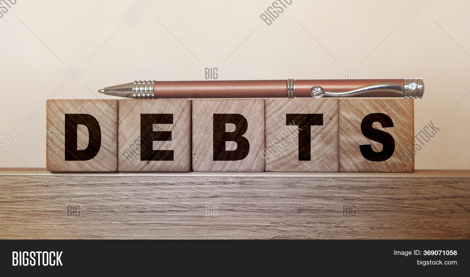 Debts Word On Wooden Image & Photo (Free Trial) | Bigstock