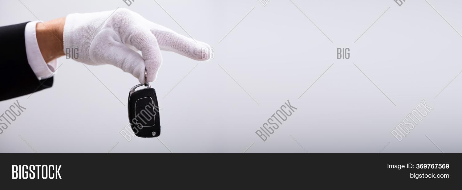 Valet's Hand Holding Image & Photo (Free Trial) | Bigstock