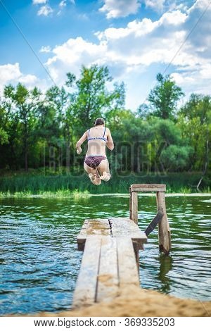 Woman Jumping Into Water Images, Illustrations & Vectors (Free) - Bigstock