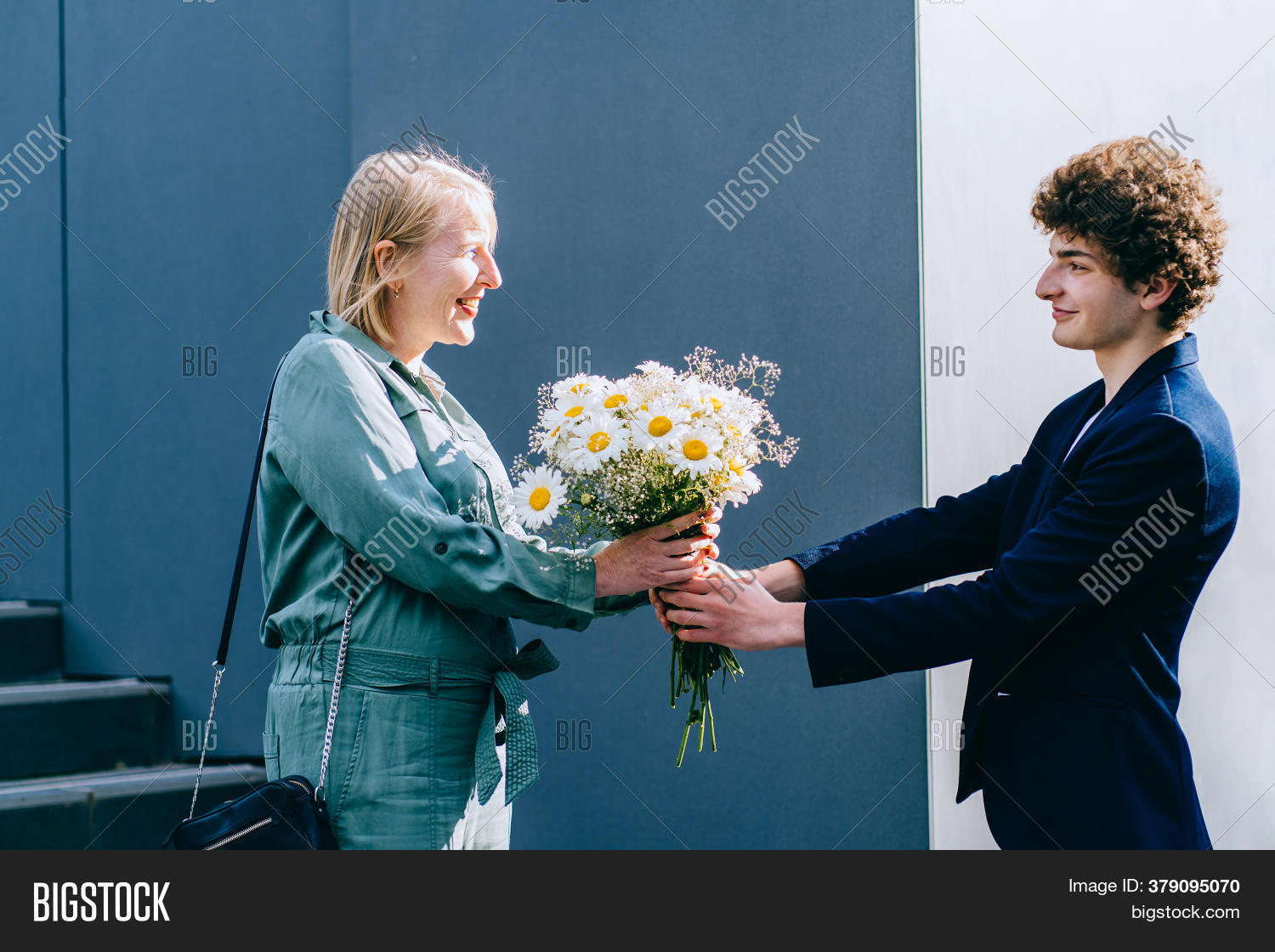 Young Curly Man Gives Image & Photo (Free Trial) | Bigstock