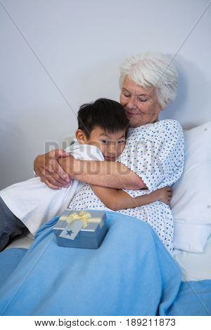 Boy Giving Hug Senior Image & Photo (Free Trial) | Bigstock