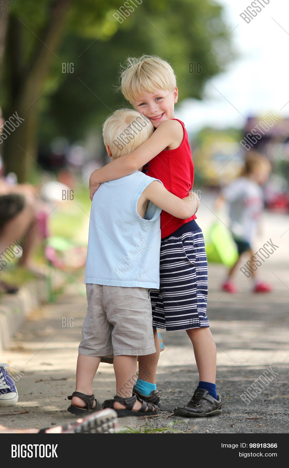 Two Teenage Brothers Hugging