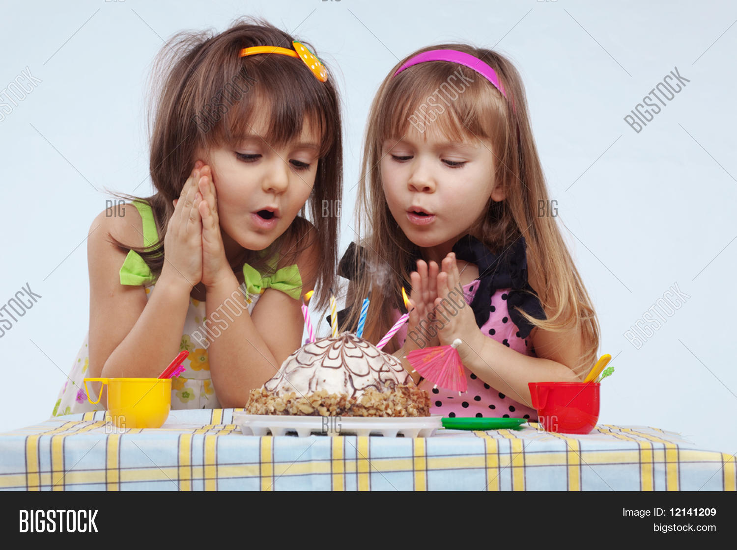 Little girls eating birthday cake Stock Photo & Stock Images | Bigstock
