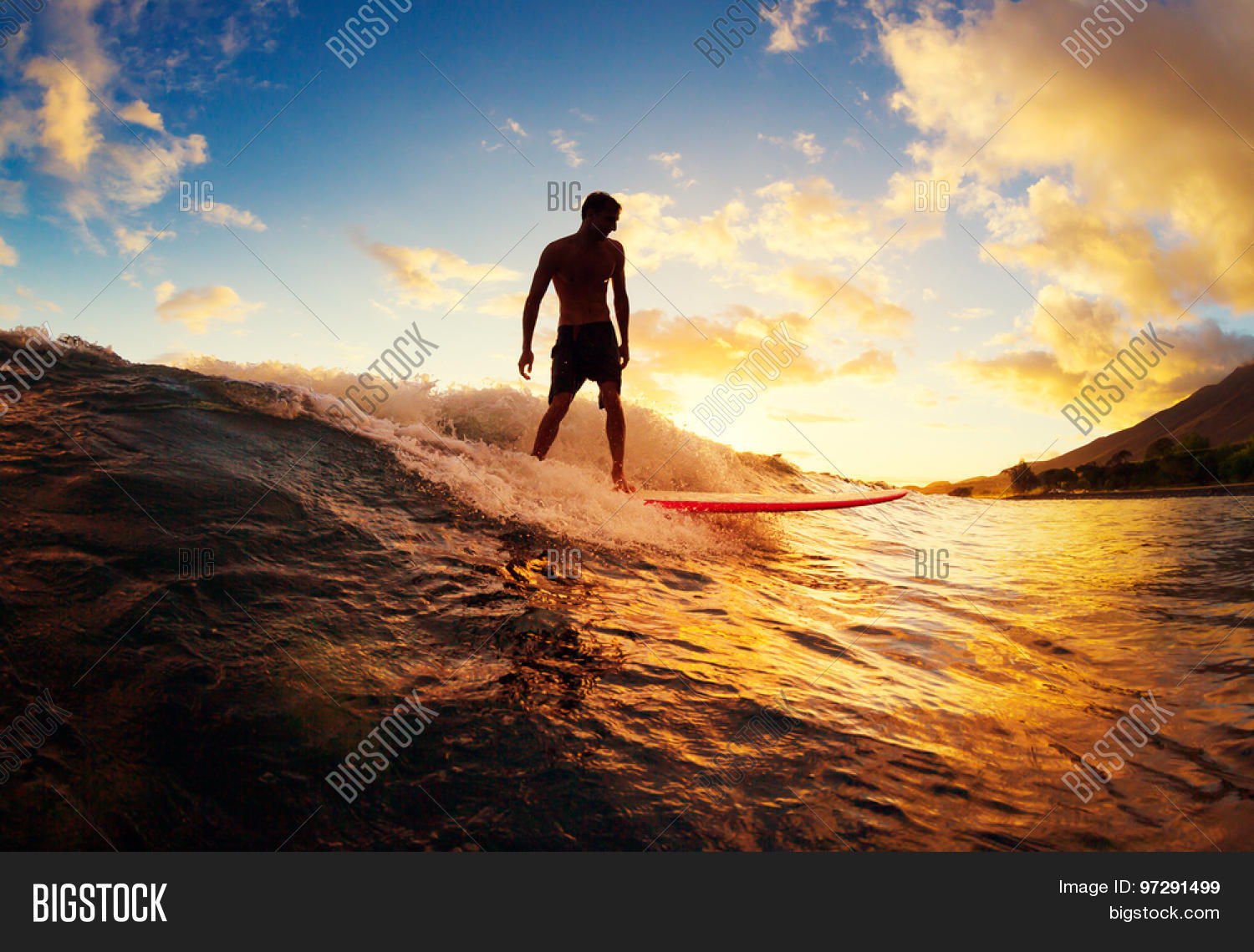 Surfing at Sunset. Young Man Riding Wave at Sunset. Outdoor Active ...