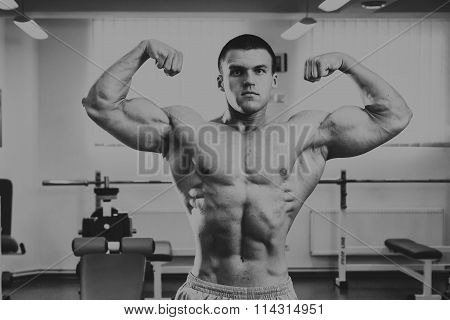 Bodybuilder at the gym. Work on hands tell muscles. - Stock Image ...