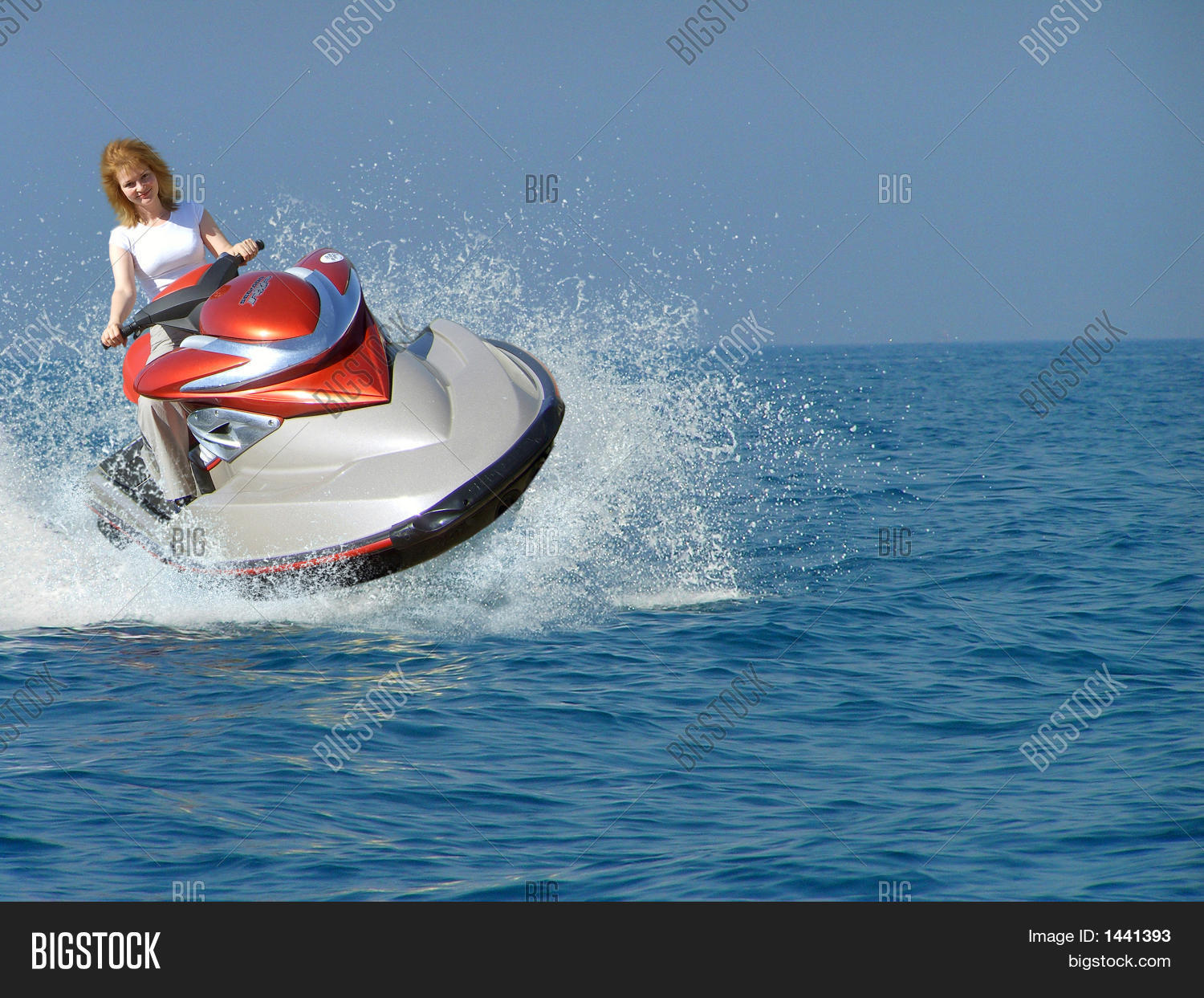Young Woman Riding Jet Ski Image & Photo | Bigstock