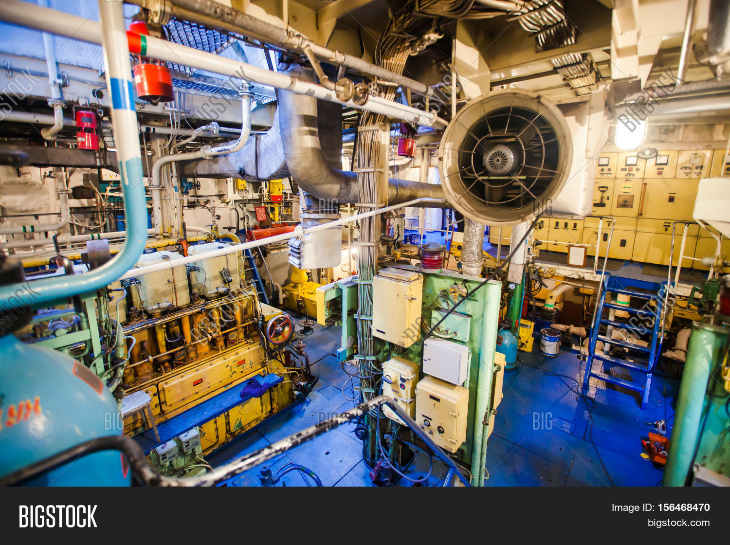 Engine Room on a cargo boat ship interior, ship's engine heavy ...
