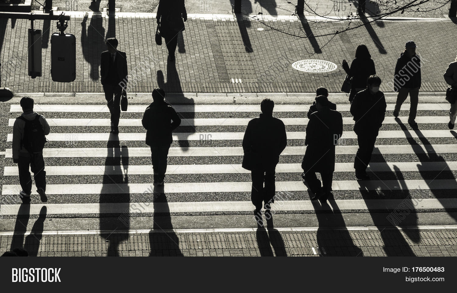 Dark Figure Walking City Streets