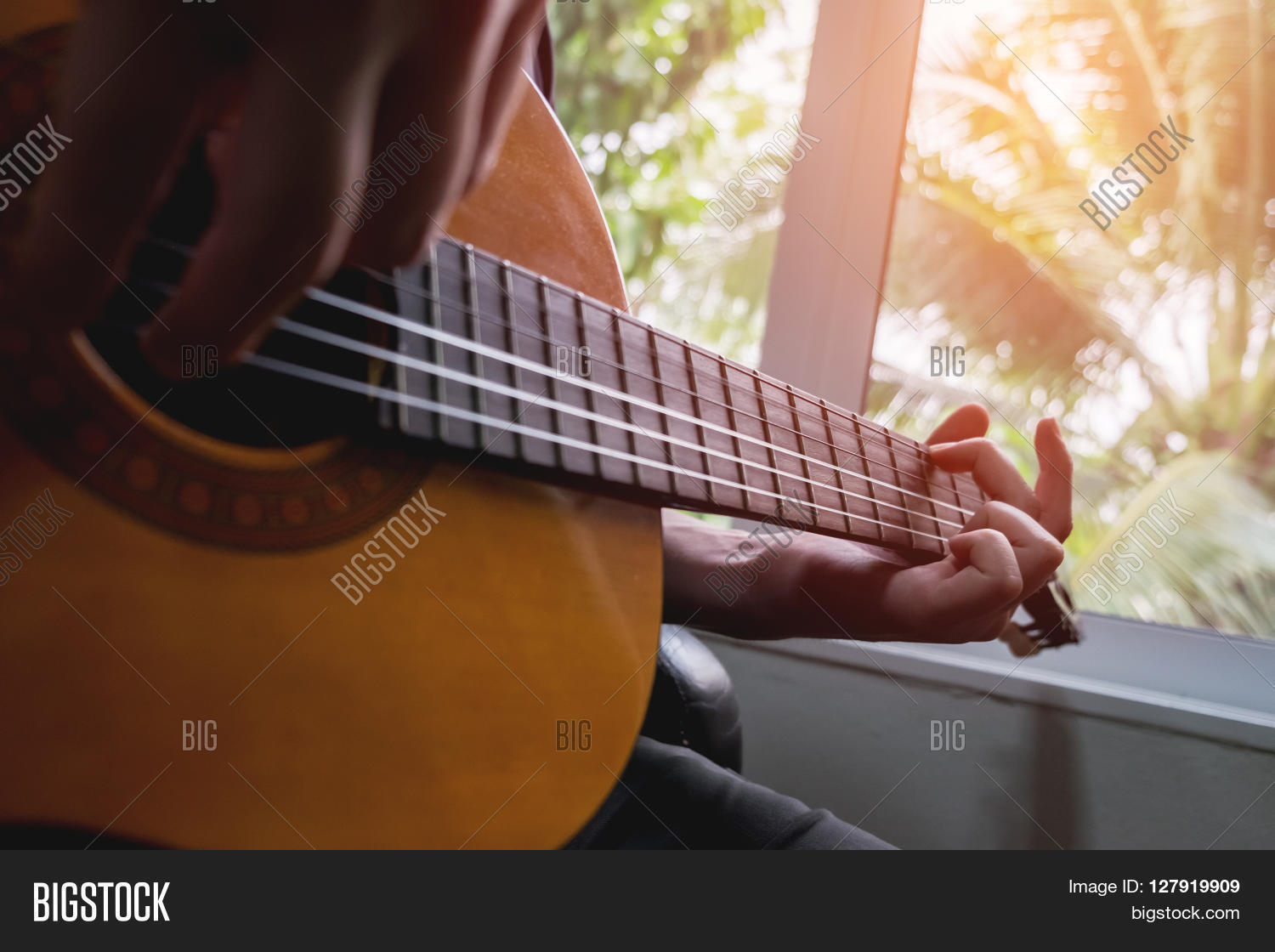 Acoustic guitar guitarist playing. Musical instrument with performer ...