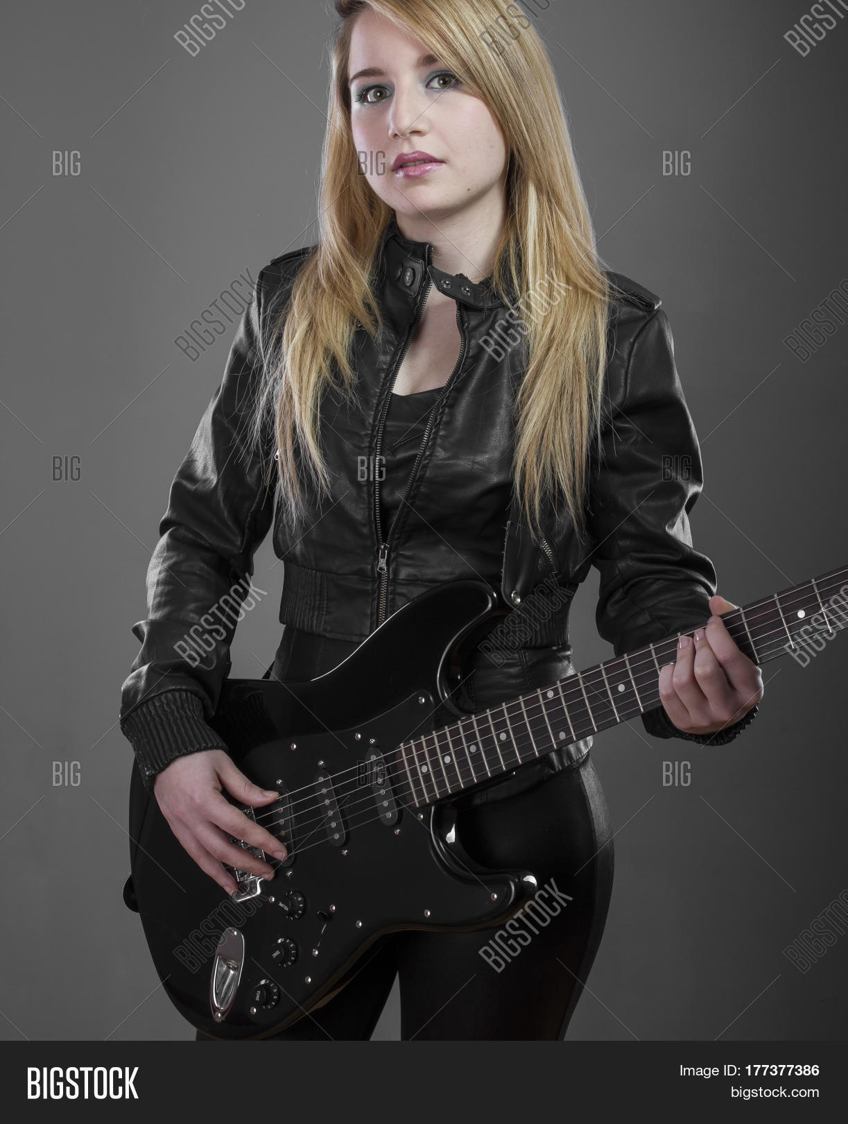 Rockstar, rocker woman with black leather outfit, lovely blonde with ...
