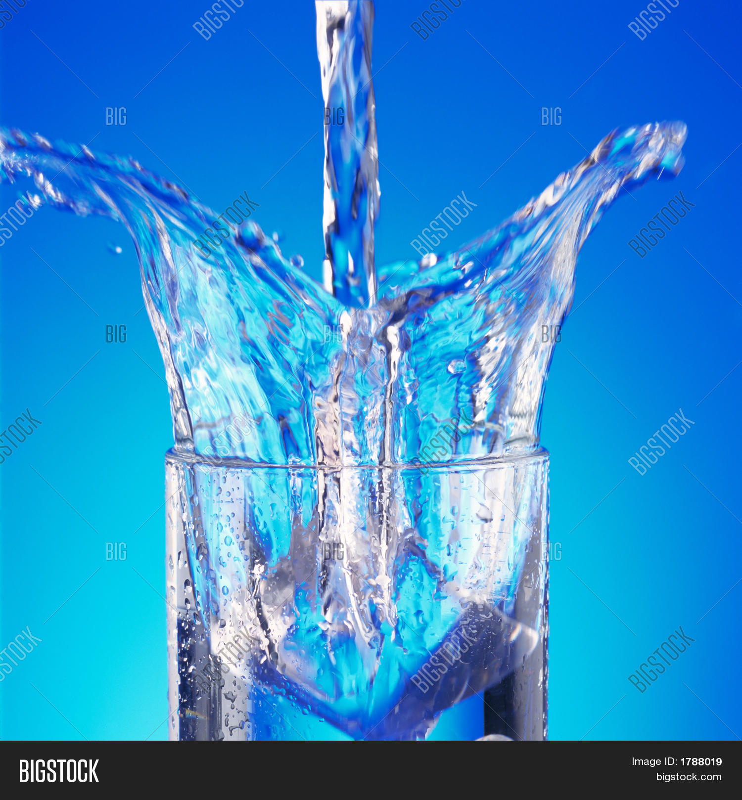 Pouring Water In Glass With A Splash Stock Photo & Stock Images | Bigstock